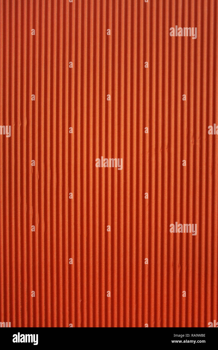 Red corrugated paper texture. Abstract red background Stock Photo - Alamy