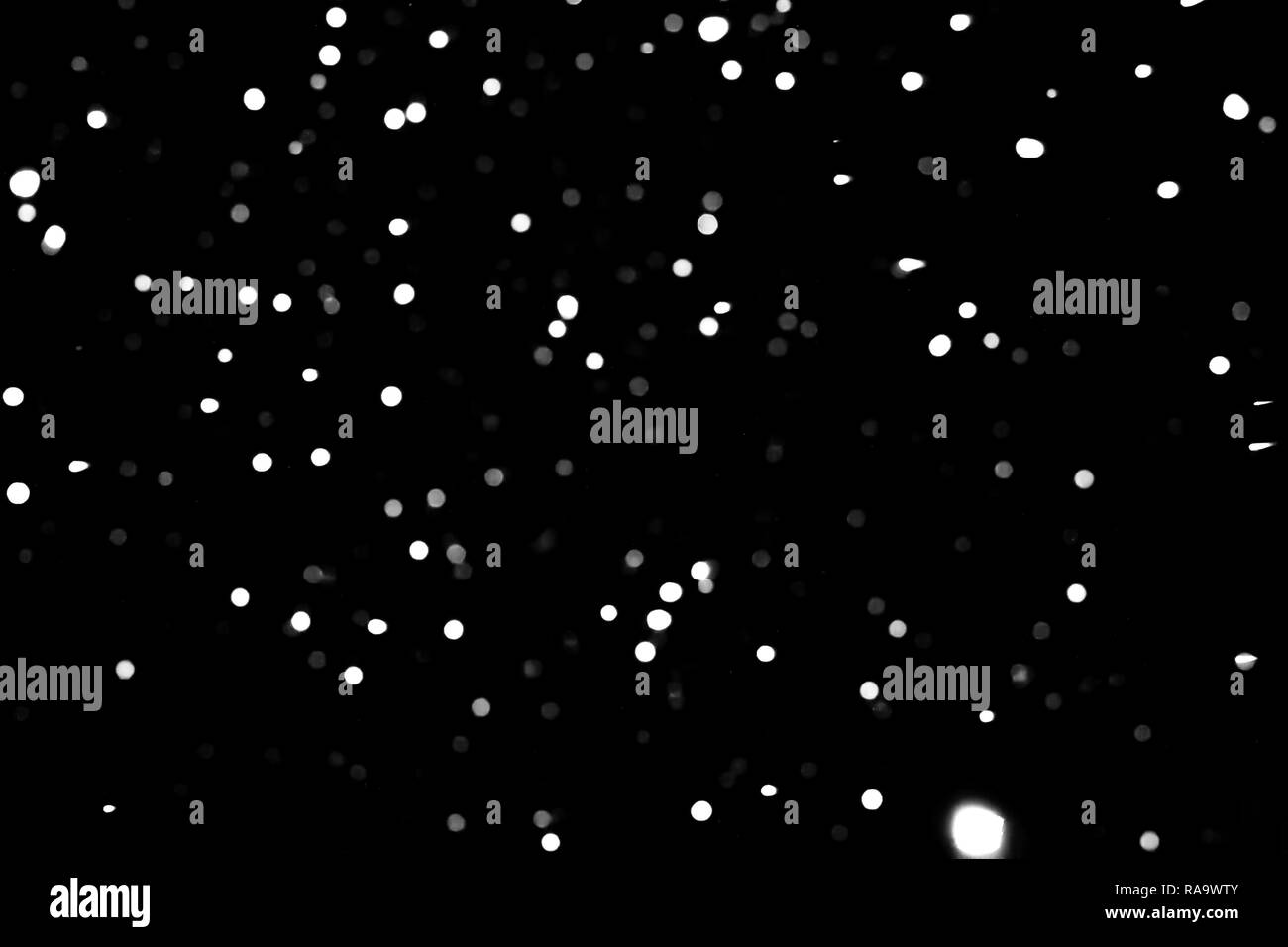 Falling snow background snowflakes Black and White Stock Photos ...