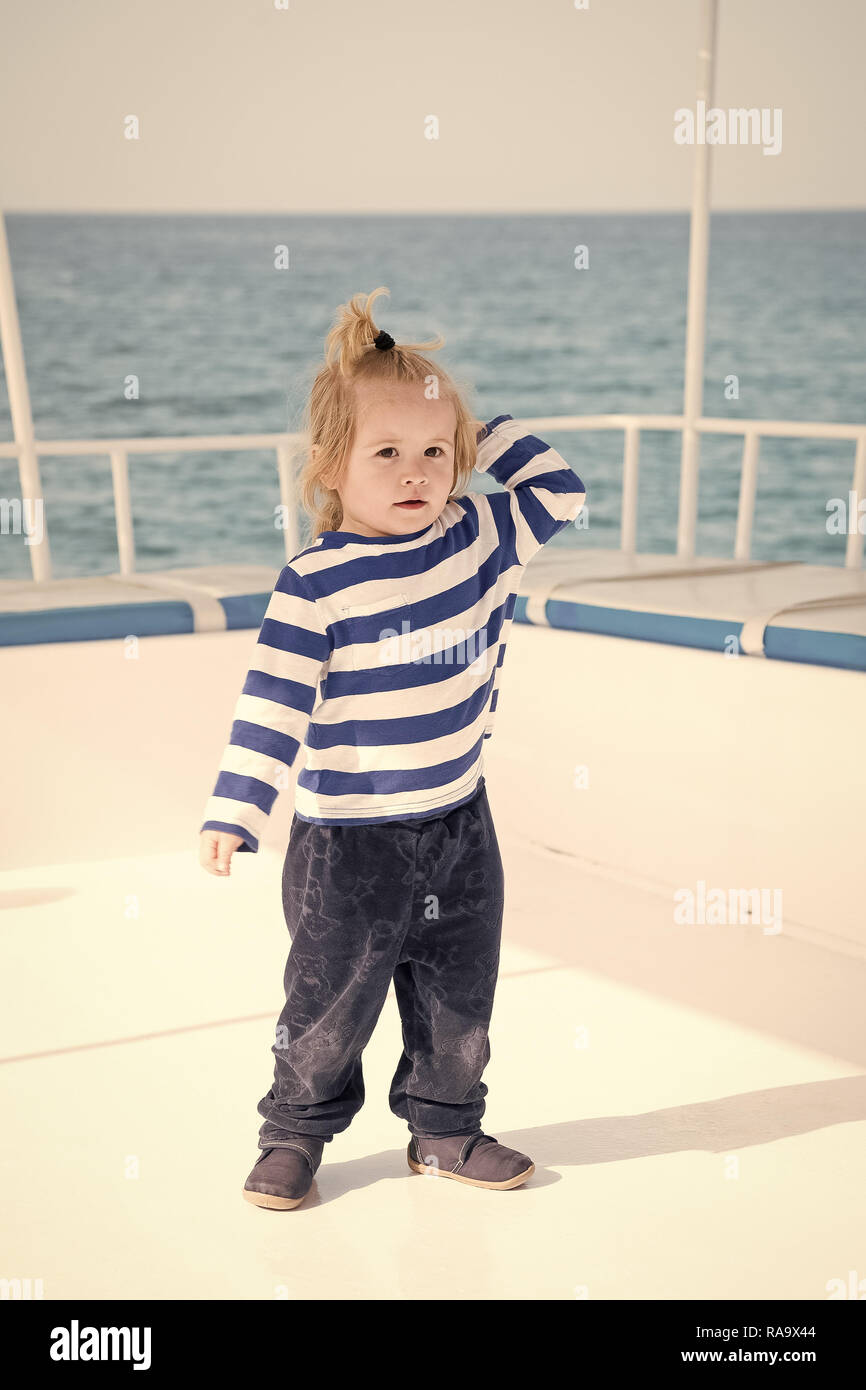 traveling, vacation. small baby boy sailor or cute child captain of ...