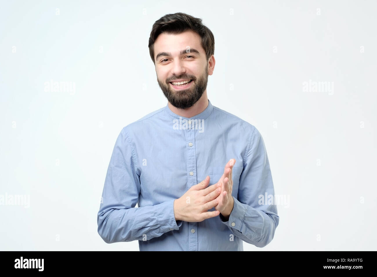 Young handsome business man over isolated background with happy face ...