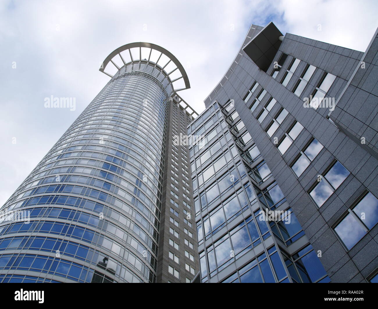 High building with reflecting windows Stock Photo - Alamy