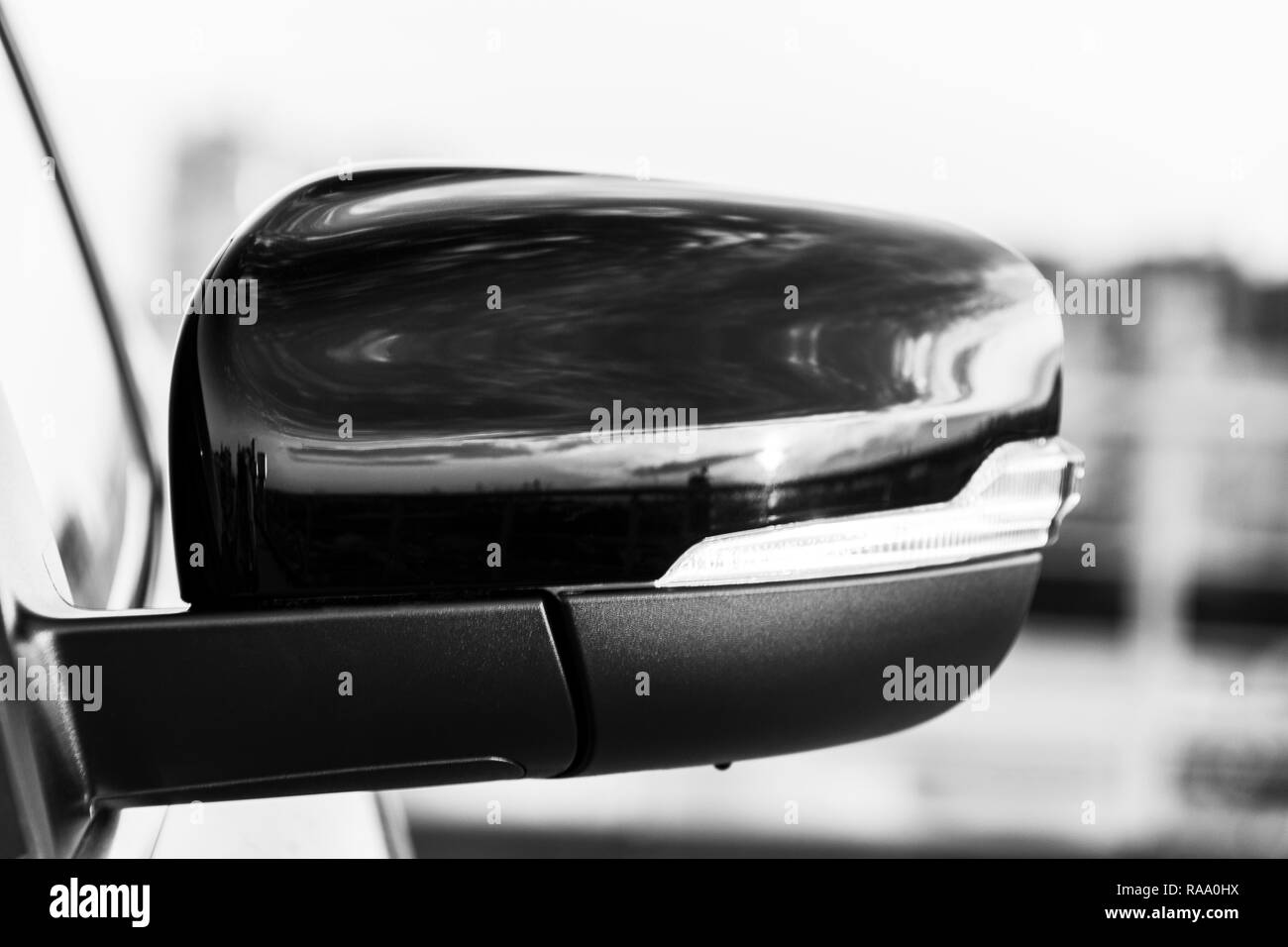Left side Car mirror with reflection of beautiful colorful sky and ...