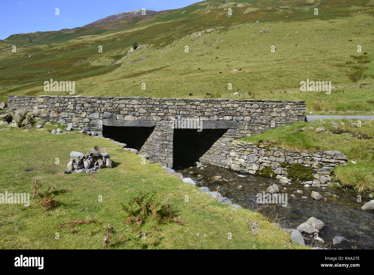 Road bridge over a stream at the Honister Pass, Cumbria, Lake District ...