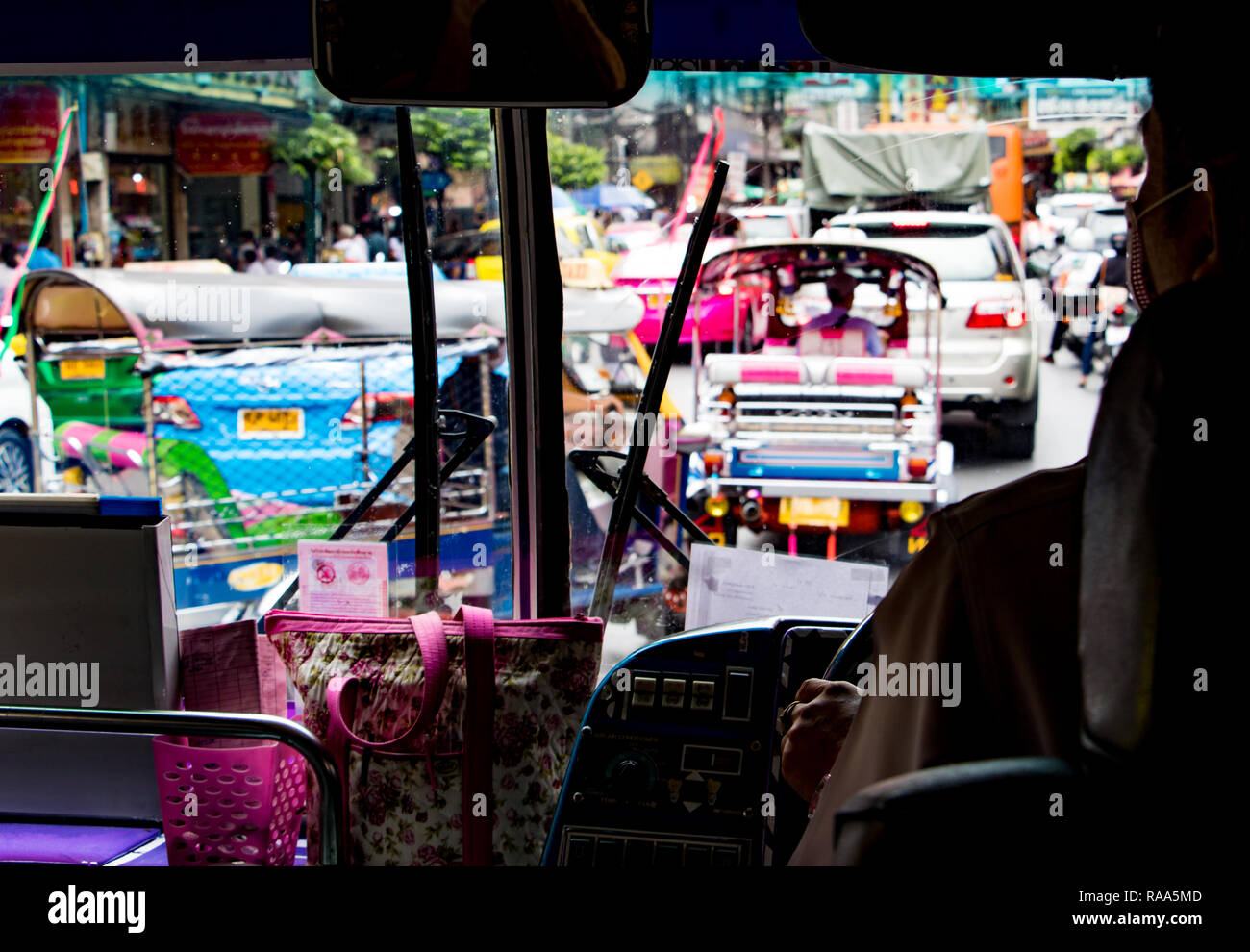 Traffic jam on the streets of Bangkok, view of public bus. Bus ride in ...