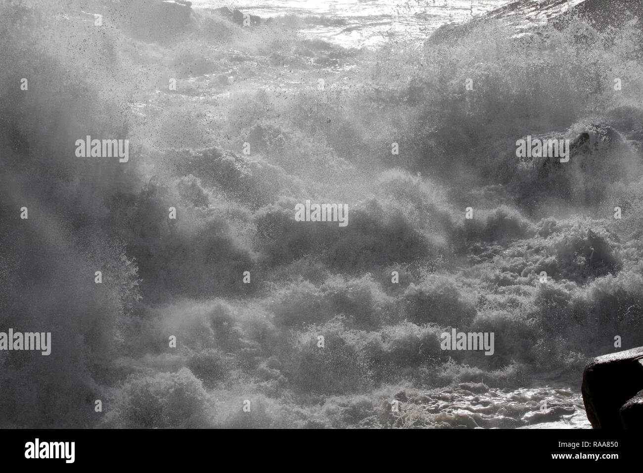 Wave breaking between rocks hi-res stock photography and images - Alamy