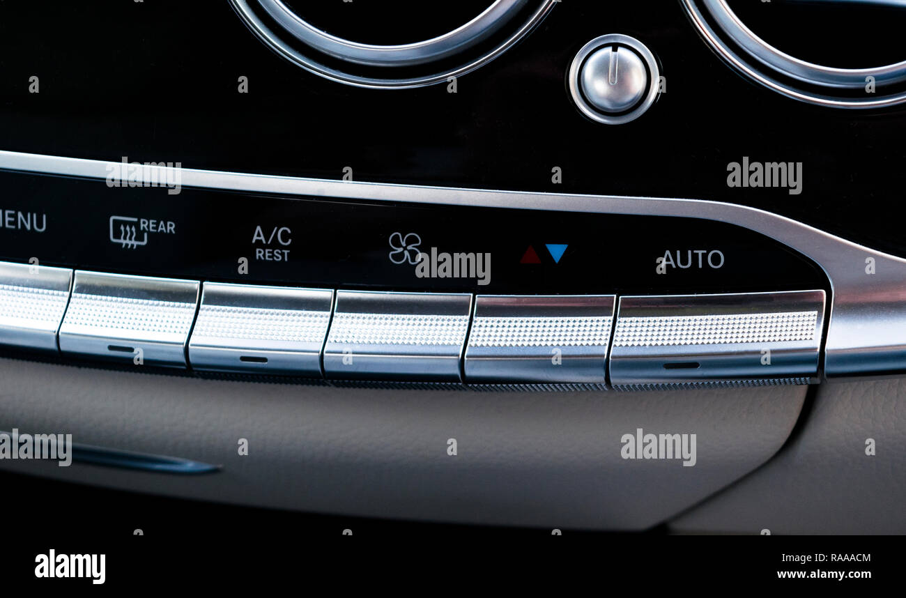 Air conditioning button inside a car. Climate control AC unit in the ...