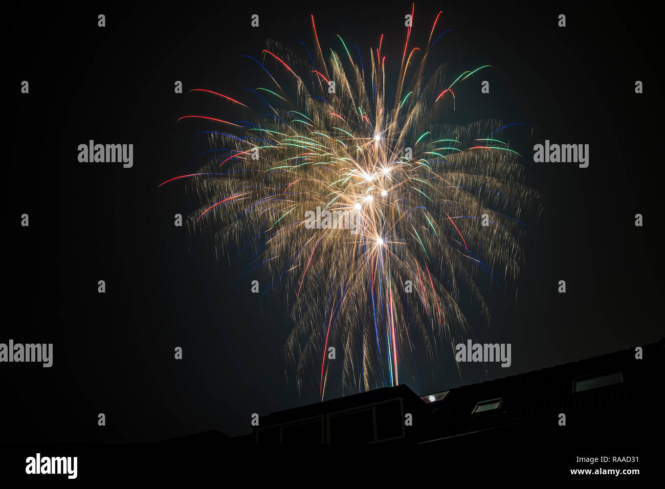 Fireworks exploding in the night sky Stock Photo - Alamy