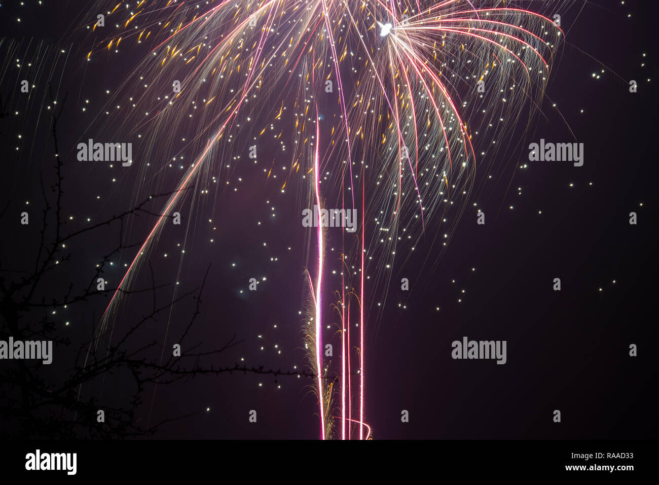 Fireworks exploding in the night sky Stock Photo - Alamy