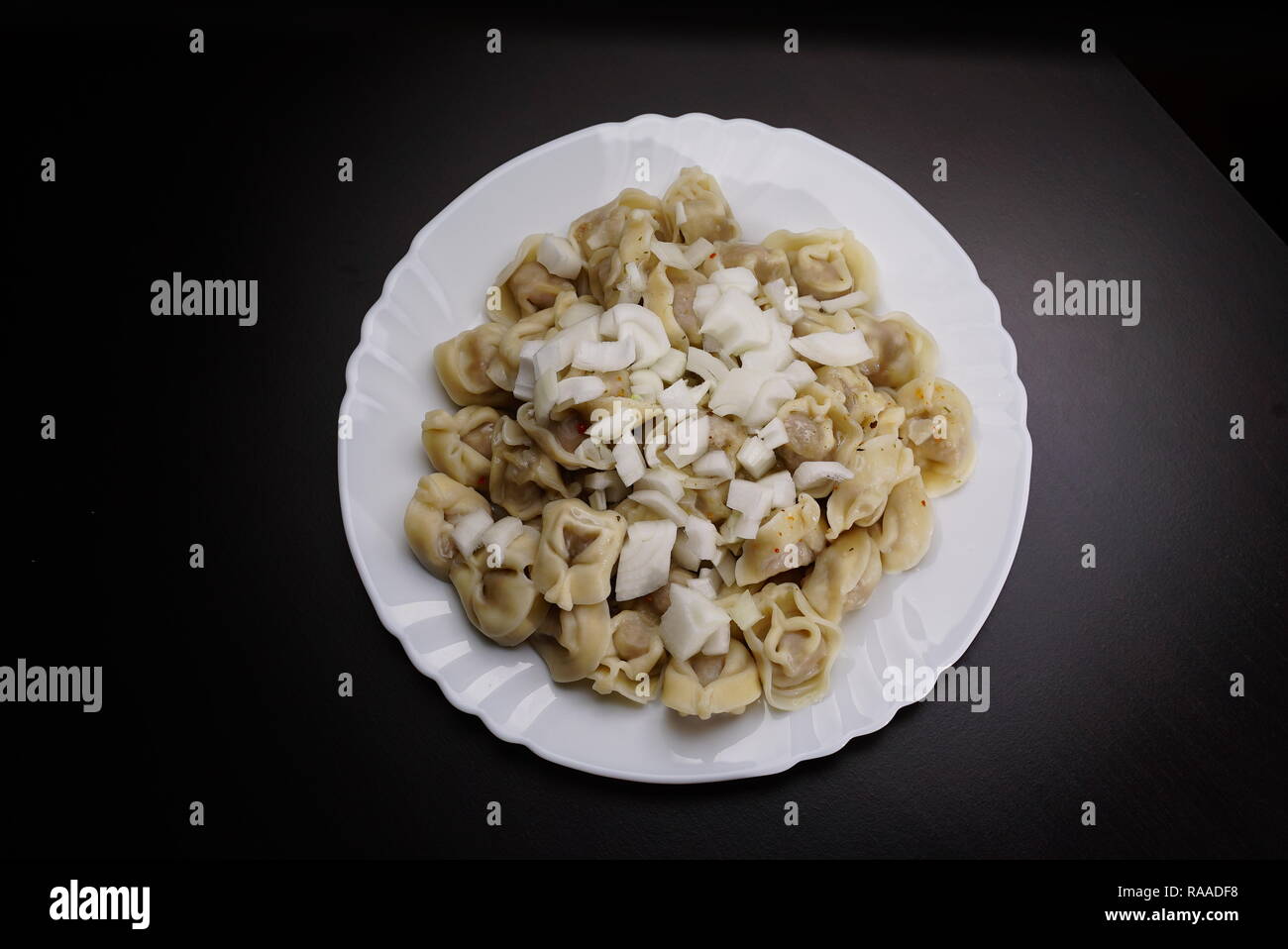 Dumplings is a Russian national dish of dough and meat fillings inside ...