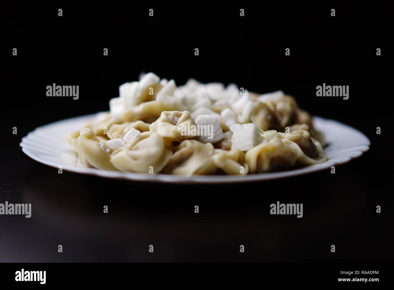 Dumplings is a Russian national dish of dough and meat fillings inside ...