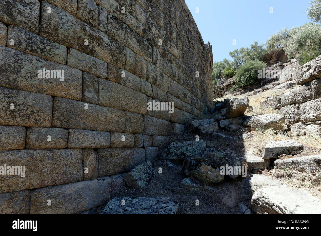 Curved cavea ashlar retaining wall of the Hellenistic theatre of ...