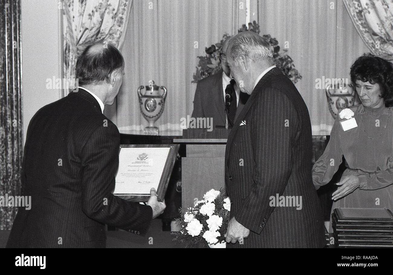 MAN GREETING ANOTHER MAN WITH AWARD Stock Photo - Alamy