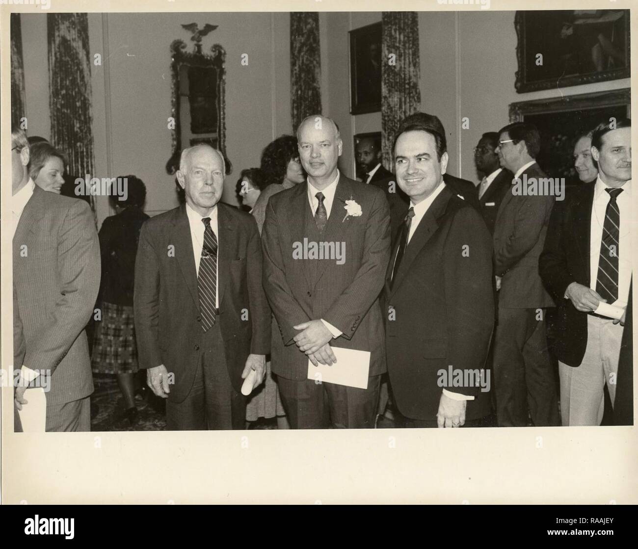 MEN STANDING AROUND TOGETHER TALKING Stock Photo - Alamy