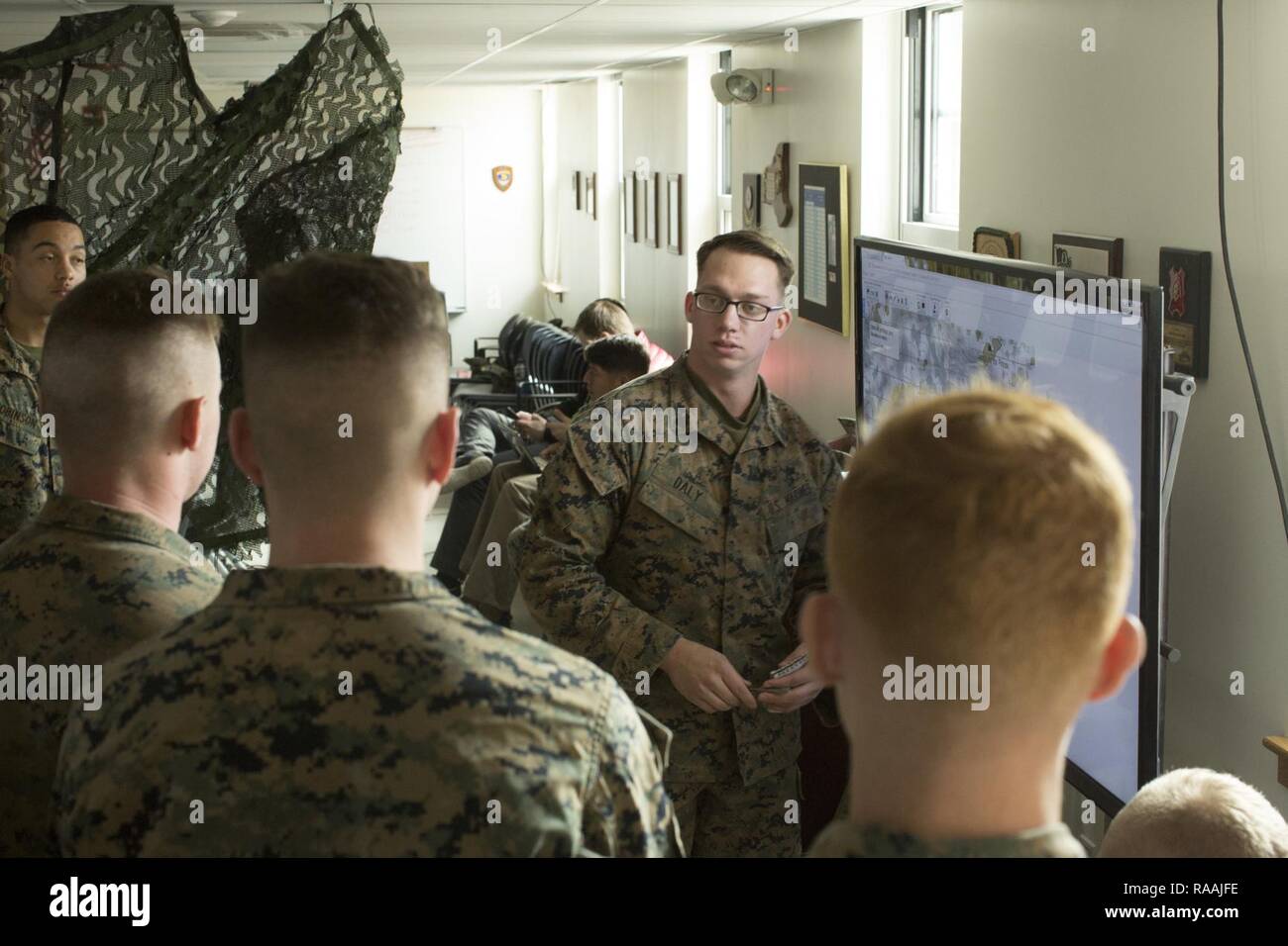 U.S. Marine Corps Sgt. Daniel A. Daly, center, a squad leader with Echo ...