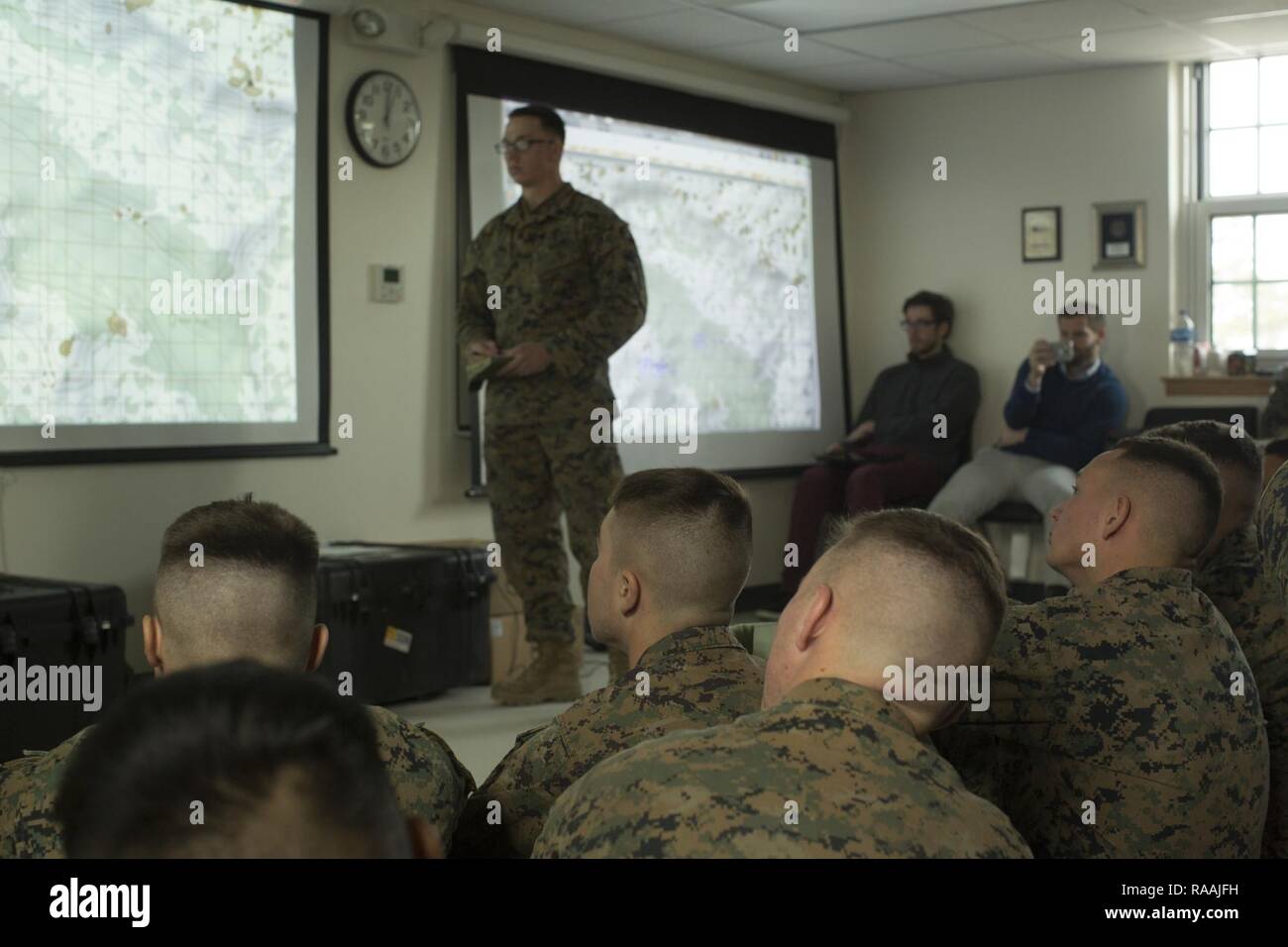 U.S. Marine Corps Sgt. Daniel A. Daly, center, a squad leader with Echo ...