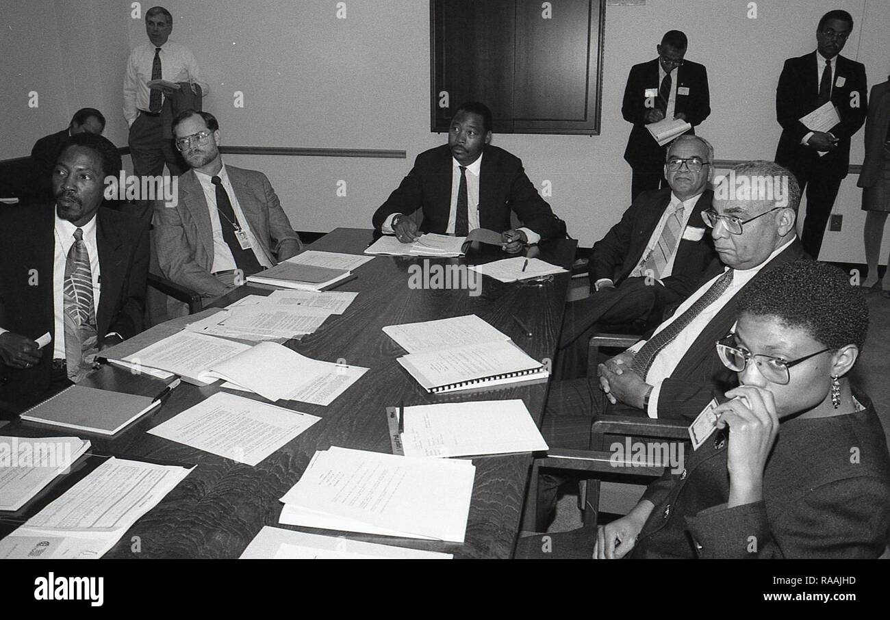 MEN AT TABLE HAVING A MEETING Stock Photo - Alamy
