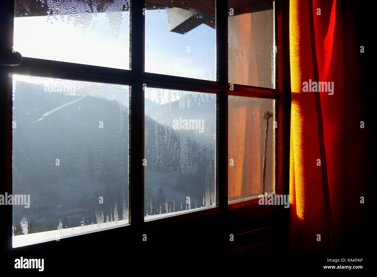 Mountainscape seen through a mountain cabin window, Le Grand Bornand ...