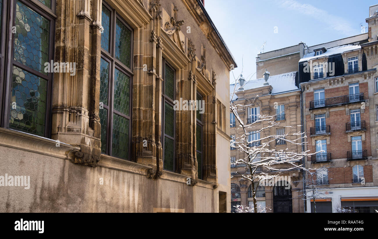 Green emerald windows of a building in Reims city center, winter France ...
