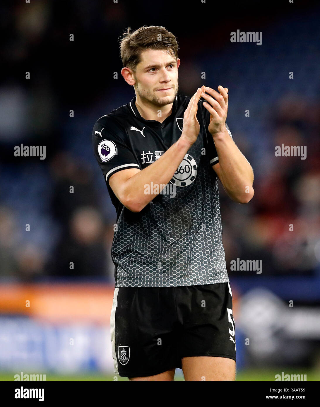 Burnley's James Tarkowski celebrates their win after the Premier League ...