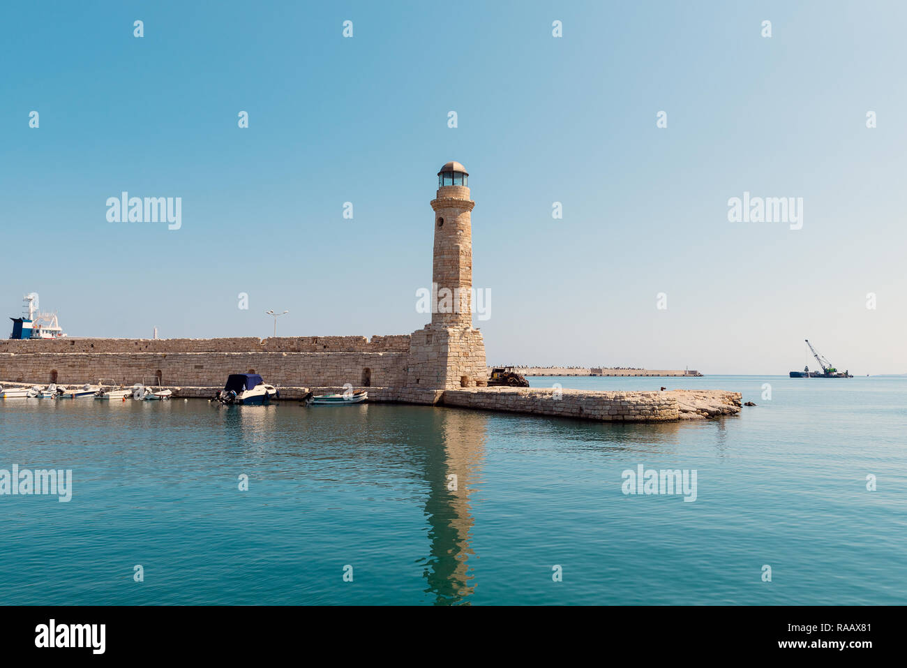 Old lighthouse at port of Rethymno town, Crete island, Greece Stock ...