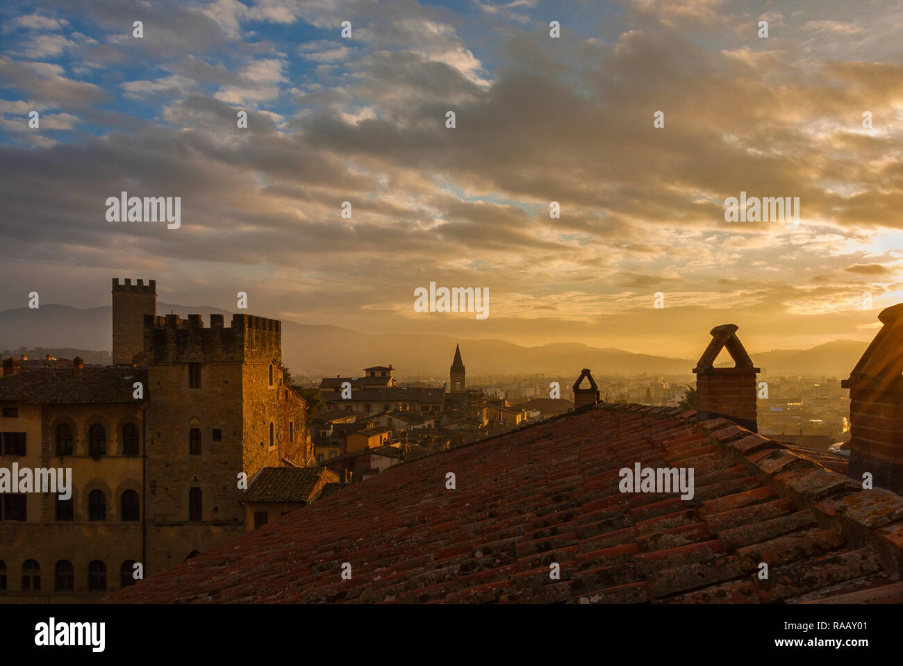 View of Arezzo historic center sunset skyline with old medieval towers ...
