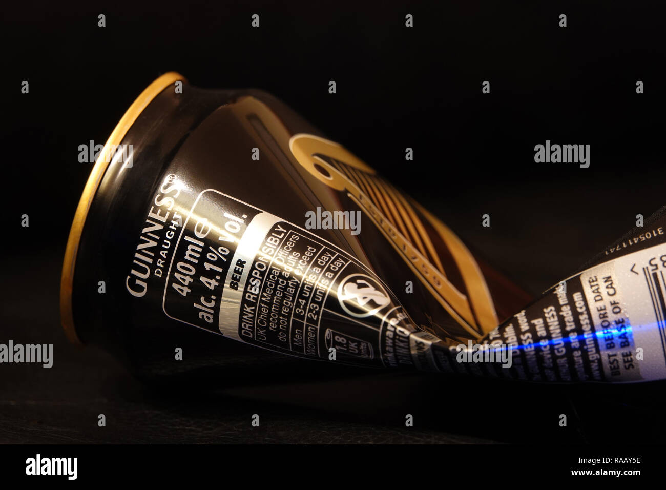 Empty crushed can of Guinness Draught Stock Photo - Alamy