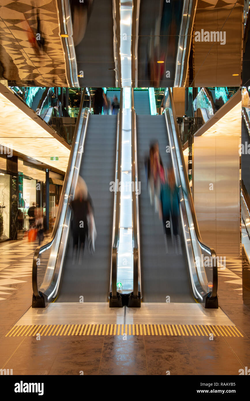 Shopping, up and down, escalator in a shopping mall Stock Photo - Alamy