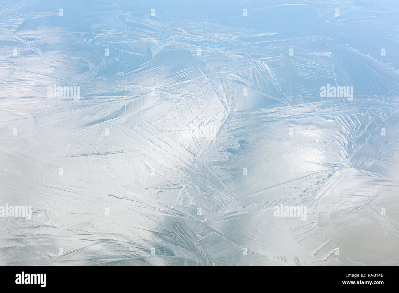 shiny frozen ice surface background with patterns and reflections ...