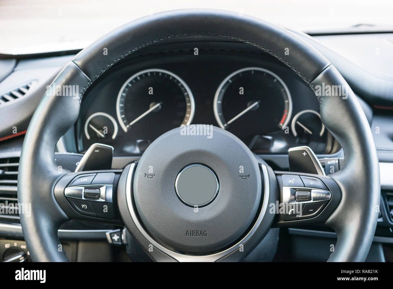 Close up of steering wheel. Car dashboard. Navigation screen. Modern ...