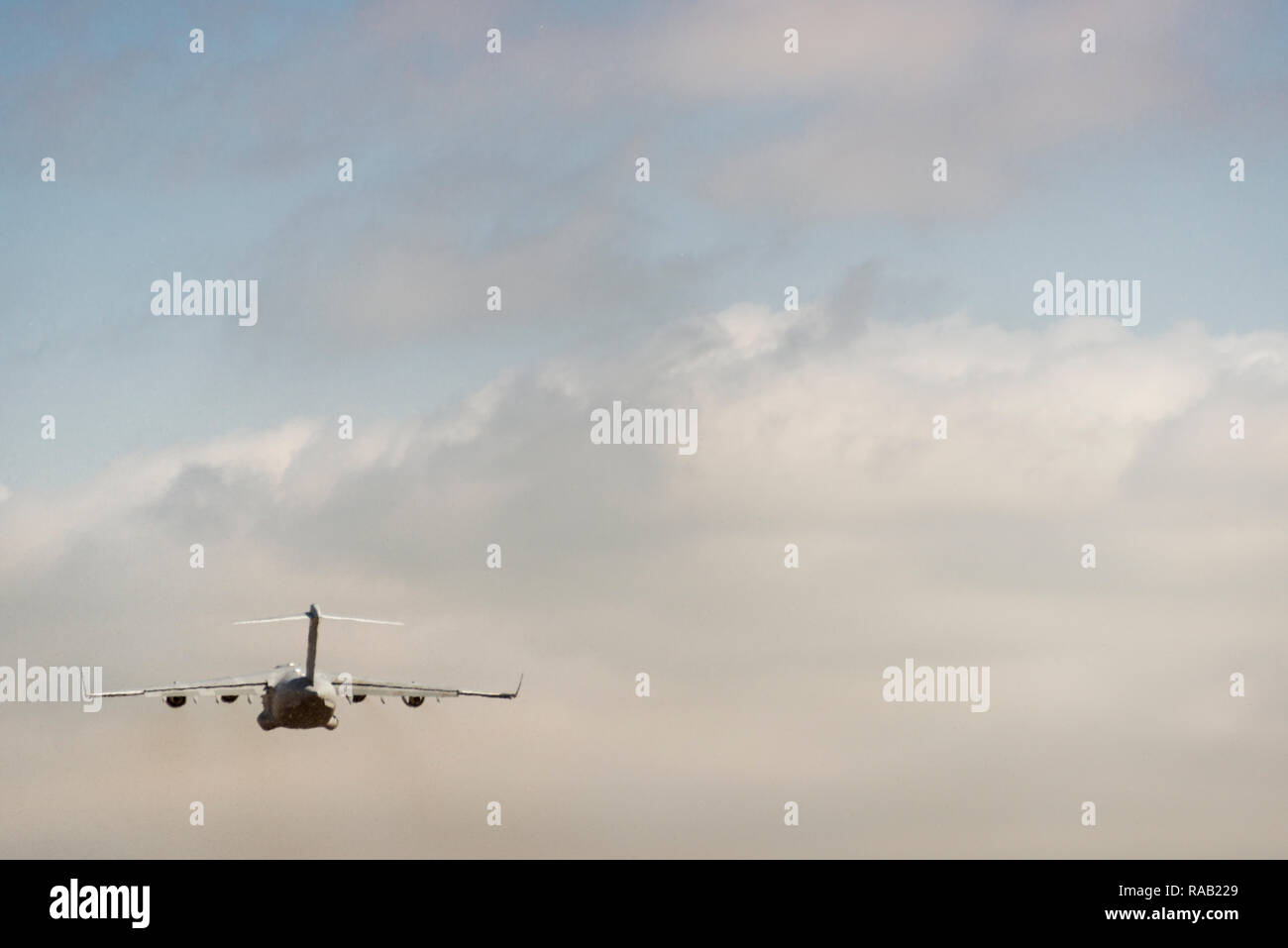 Military cargo plane taking off Stock Photo - Alamy