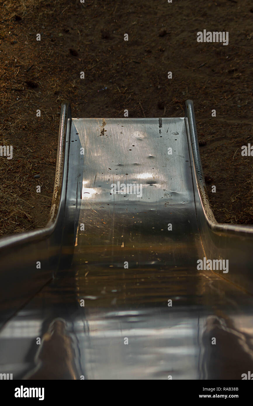 end of an old fashioned silver slide Stock Photo - Alamy