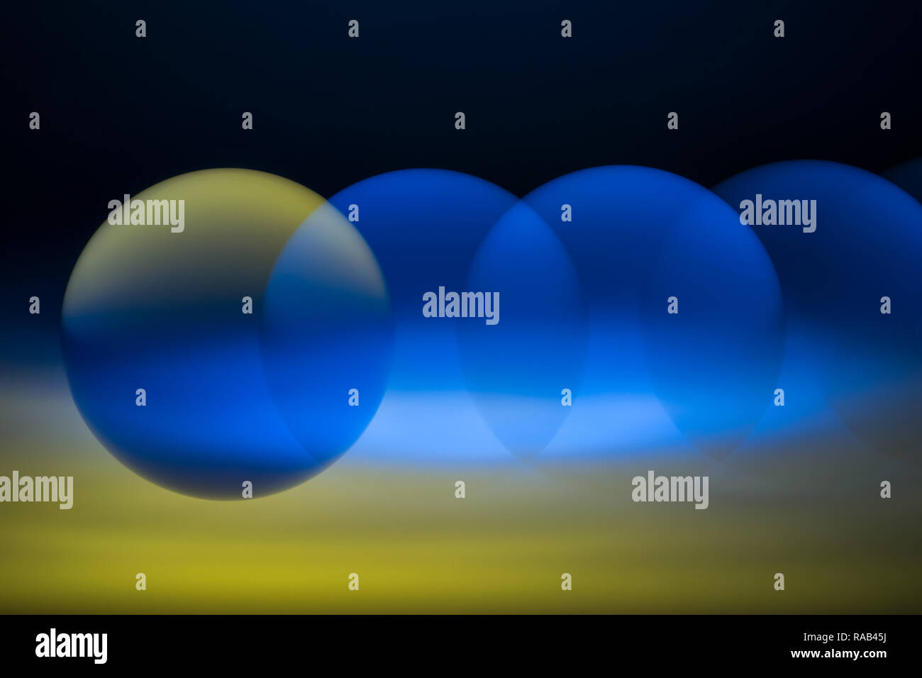 glass objects in colored stroboscope light Stock Photo - Alamy