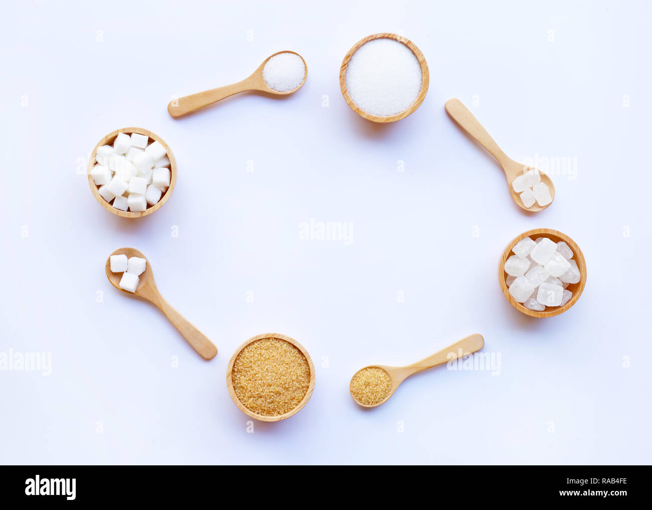 Various types of sugar on white background Stock Photo - Alamy