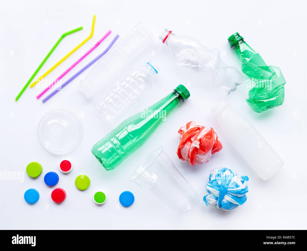 Plastic waste on over white background. Top view Stock Photo - Alamy