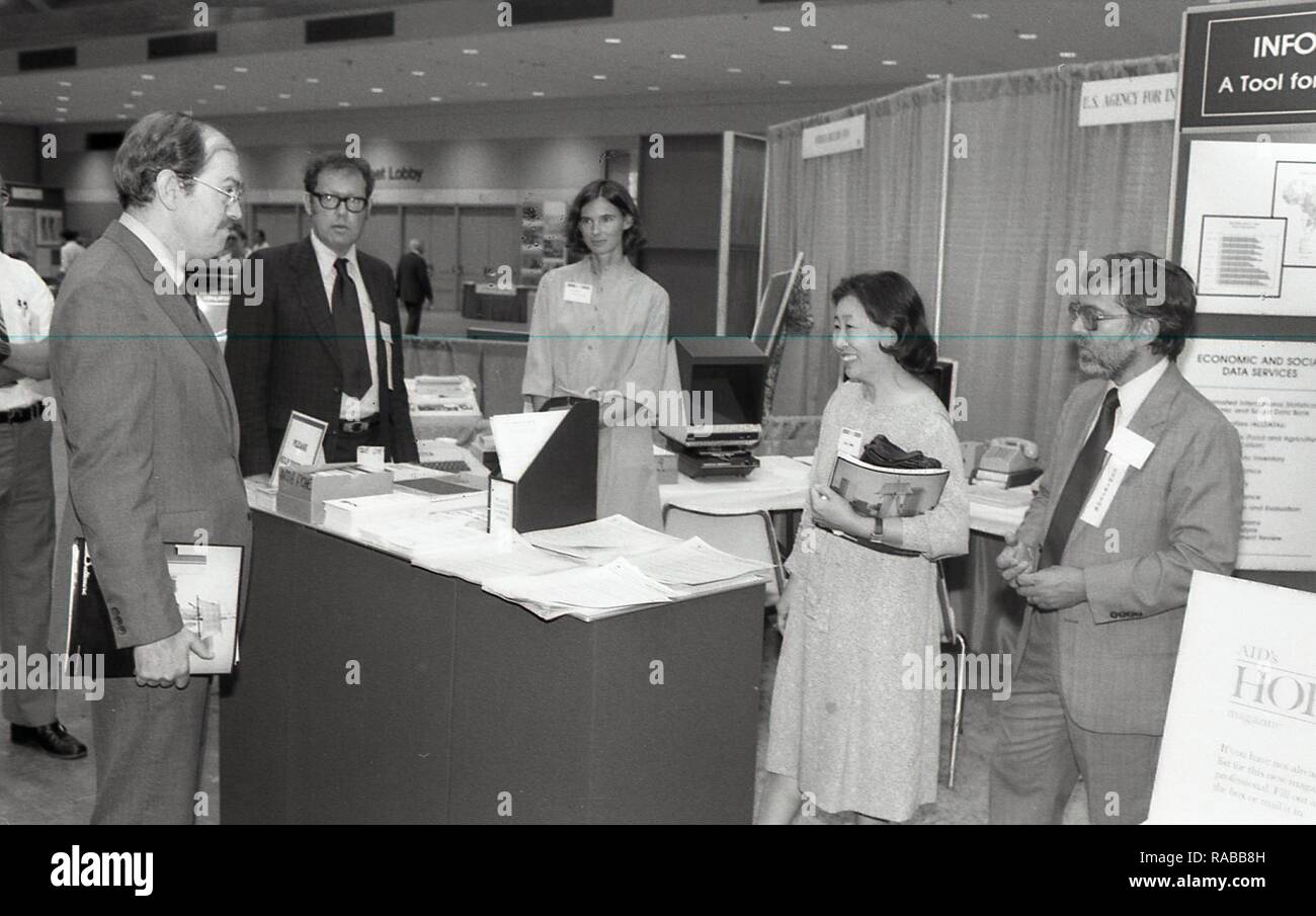People standing; conversing Stock Photo - Alamy