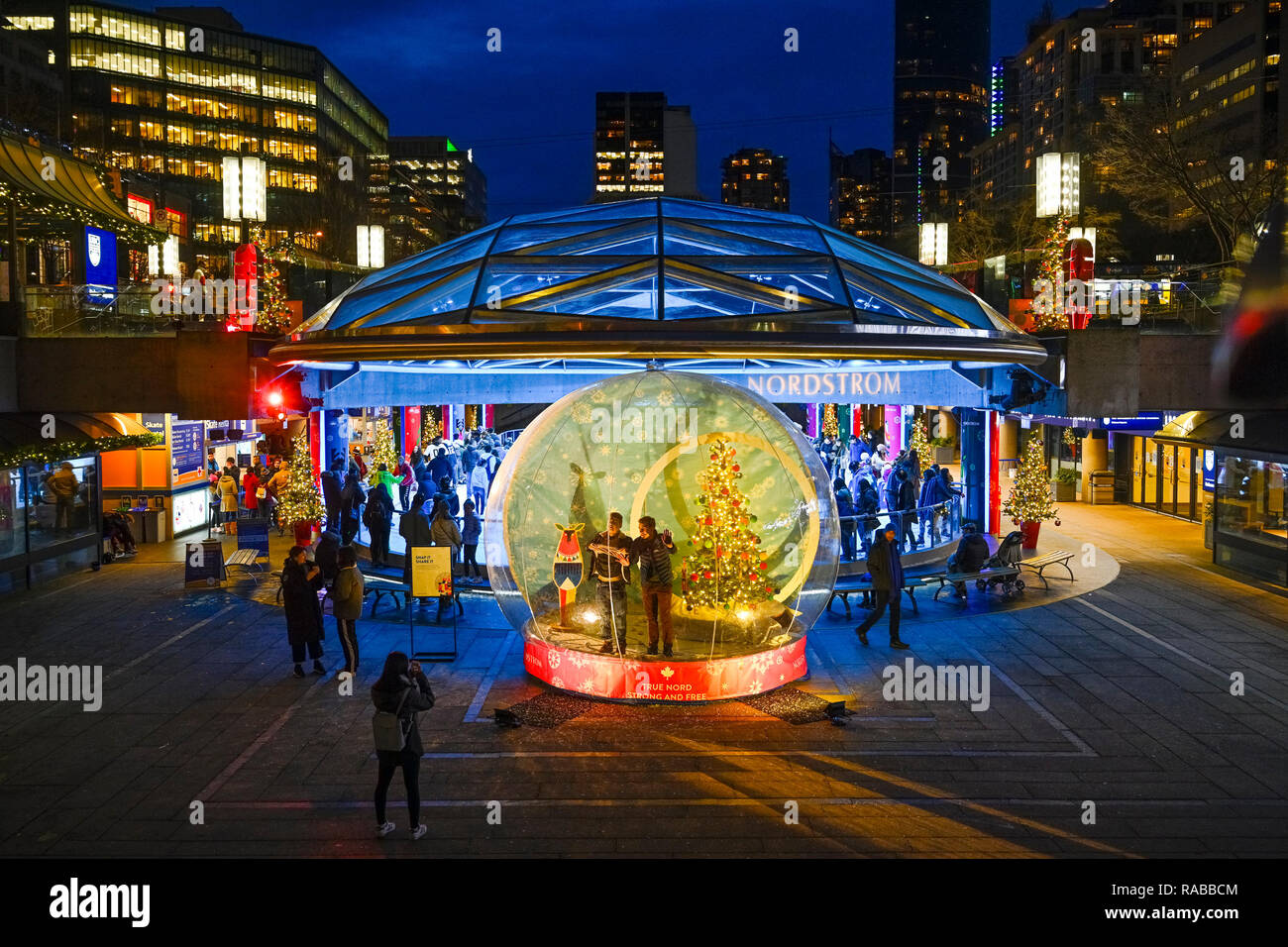 Human snow globe, Robson Square, Ice skating rink, Vancouver, British ...
