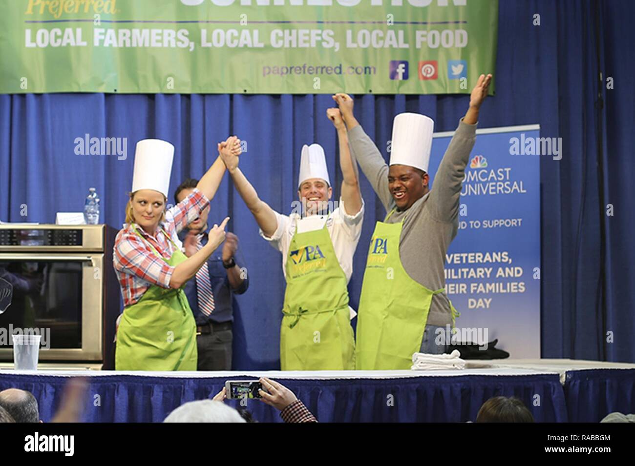 U.S. Navy Culinary Specialist PO1(SW) Patrick Parigi (center ...