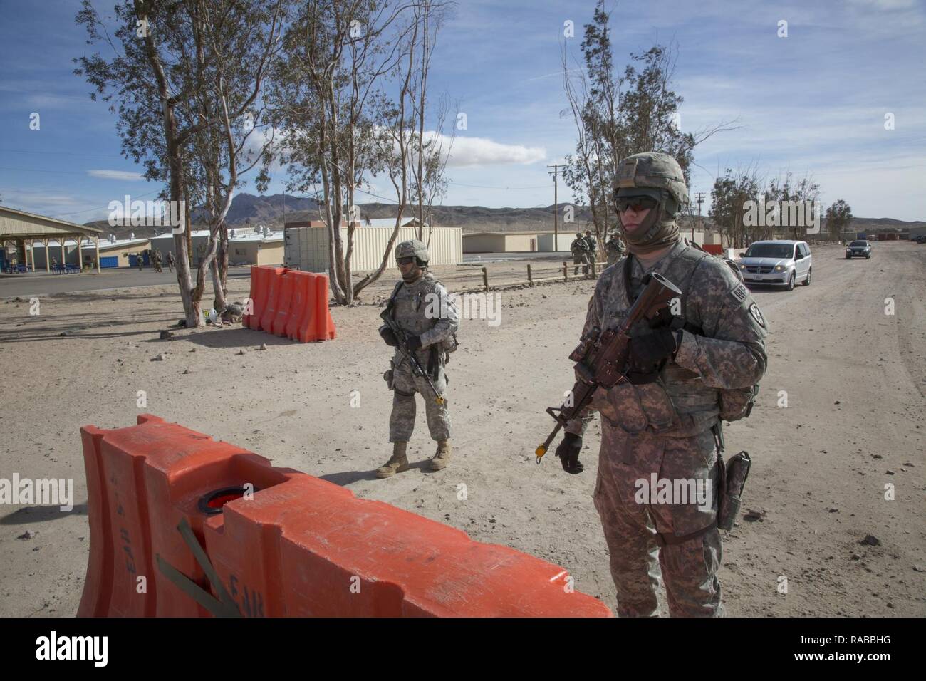 U.S. Army Spc. Triston Plumley, right, and Spc. Andrew Tagalicod, left ...