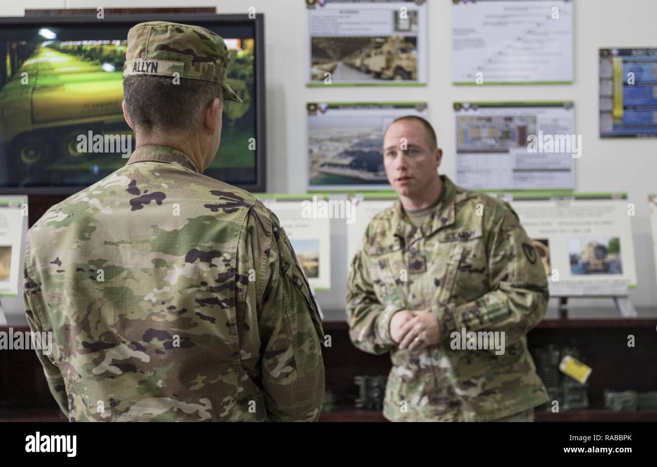 Gen. Daniel Allyn, Vice Chief of Staff of the Army, listens to a ...