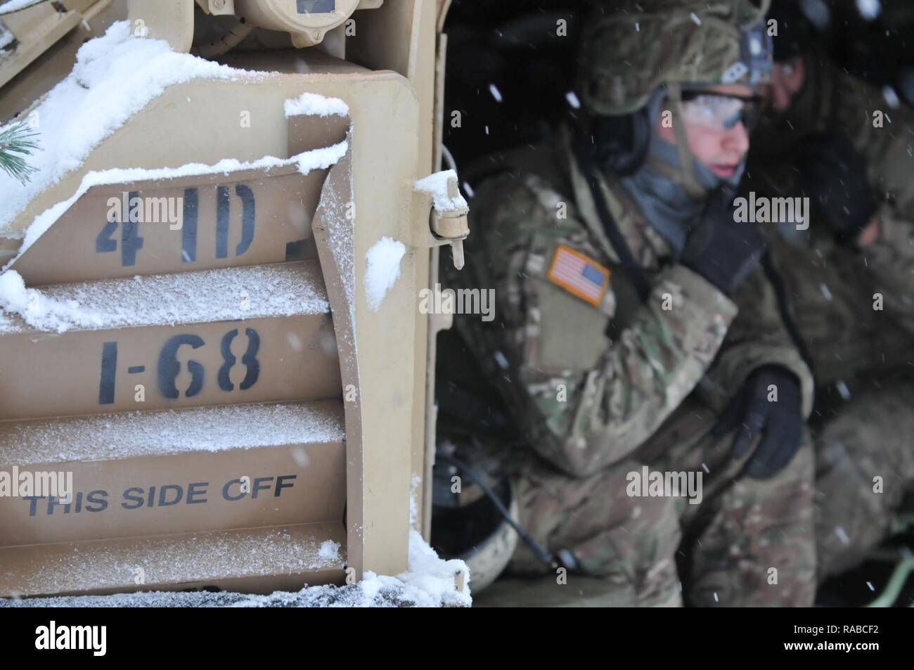 A U.S. Army M2A2 Bradley Fighting Vehicle crew member, 1st Battalion ...