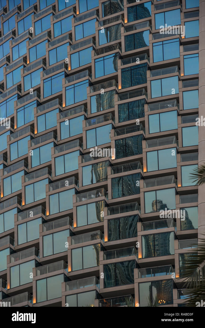 Dubai, UAE - Dec 9, 2018. Modern office building detail, glass surface ...