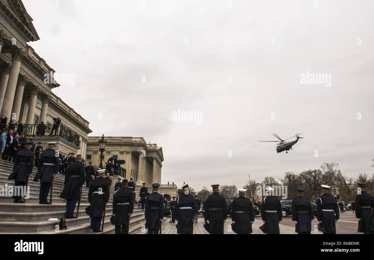 U.S. service members with the Joint Armed Forces Honor Guard line the ...