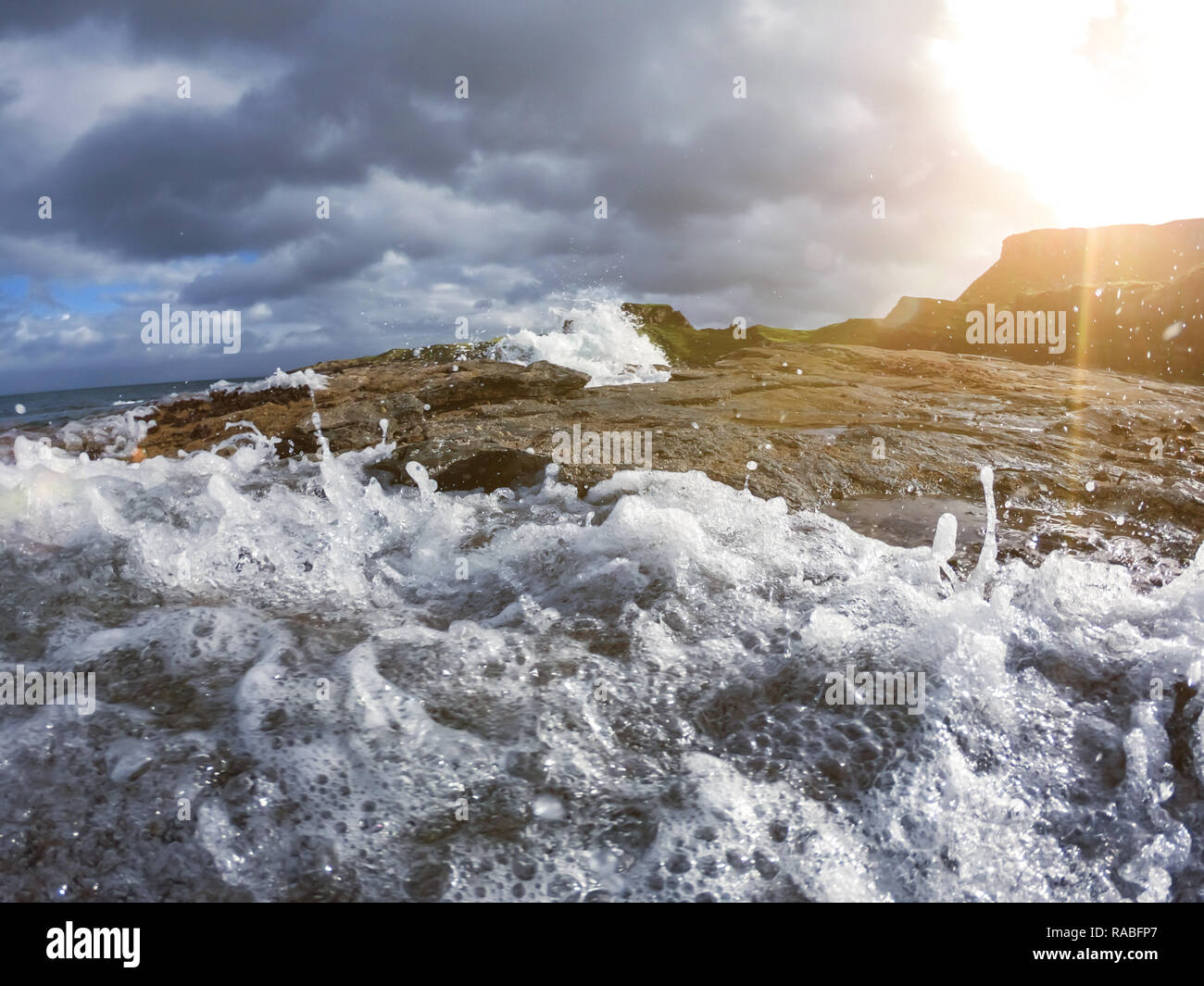 Blue Ocean Wave Crashing the coastline at sunrise Stock Photo - Alamy
