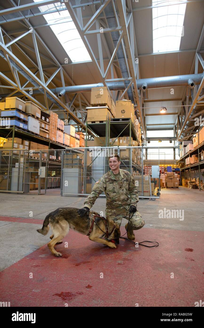 U.S. Army Sgt. Brandon Meyer congratulates Meki, an eight-year-old ...