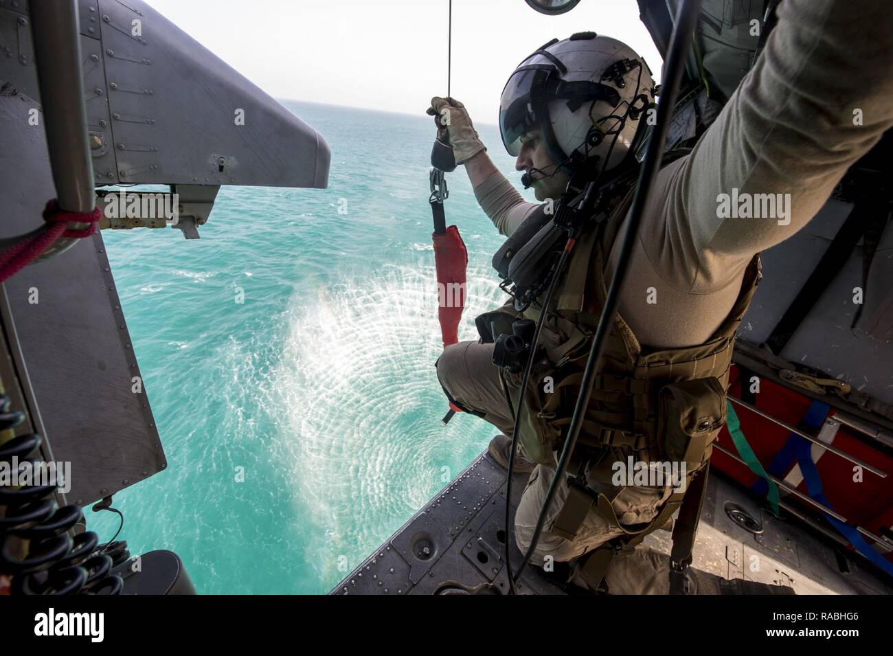 Naval Aircrewman (Helicopter) 2nd Class Nicholas Flynn, assigned to the ...