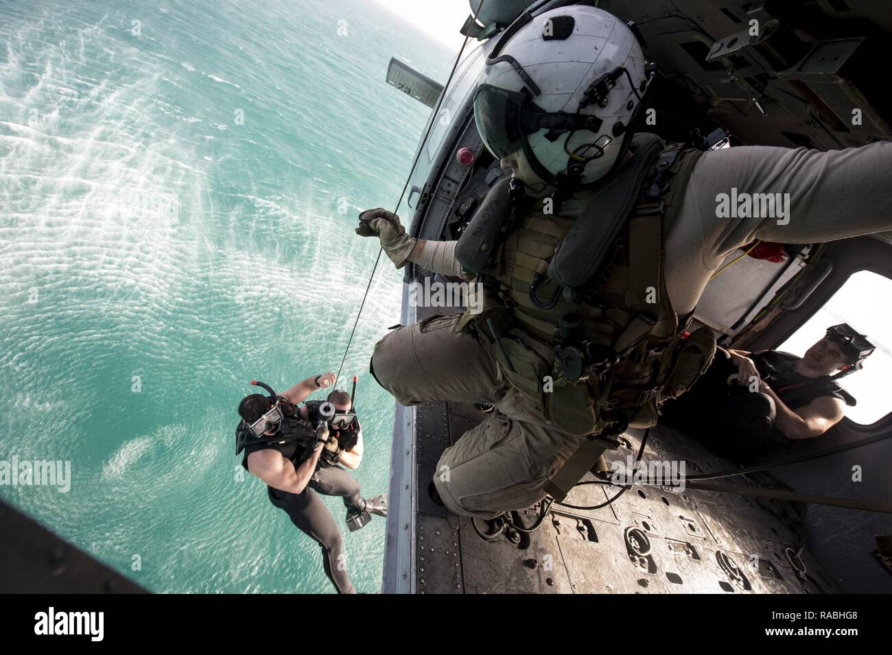 Naval Aircrewman (Helicopter) 2nd Class Nicholas Flynn hoists Naval ...