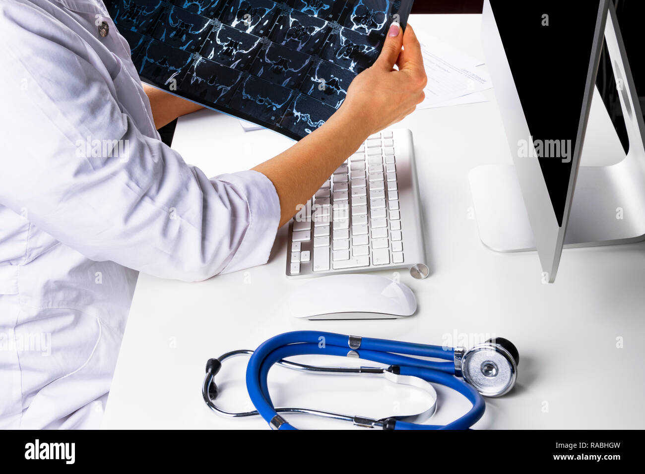 Doctor looking at computer tomography x-ray image, medicine doctor's ...