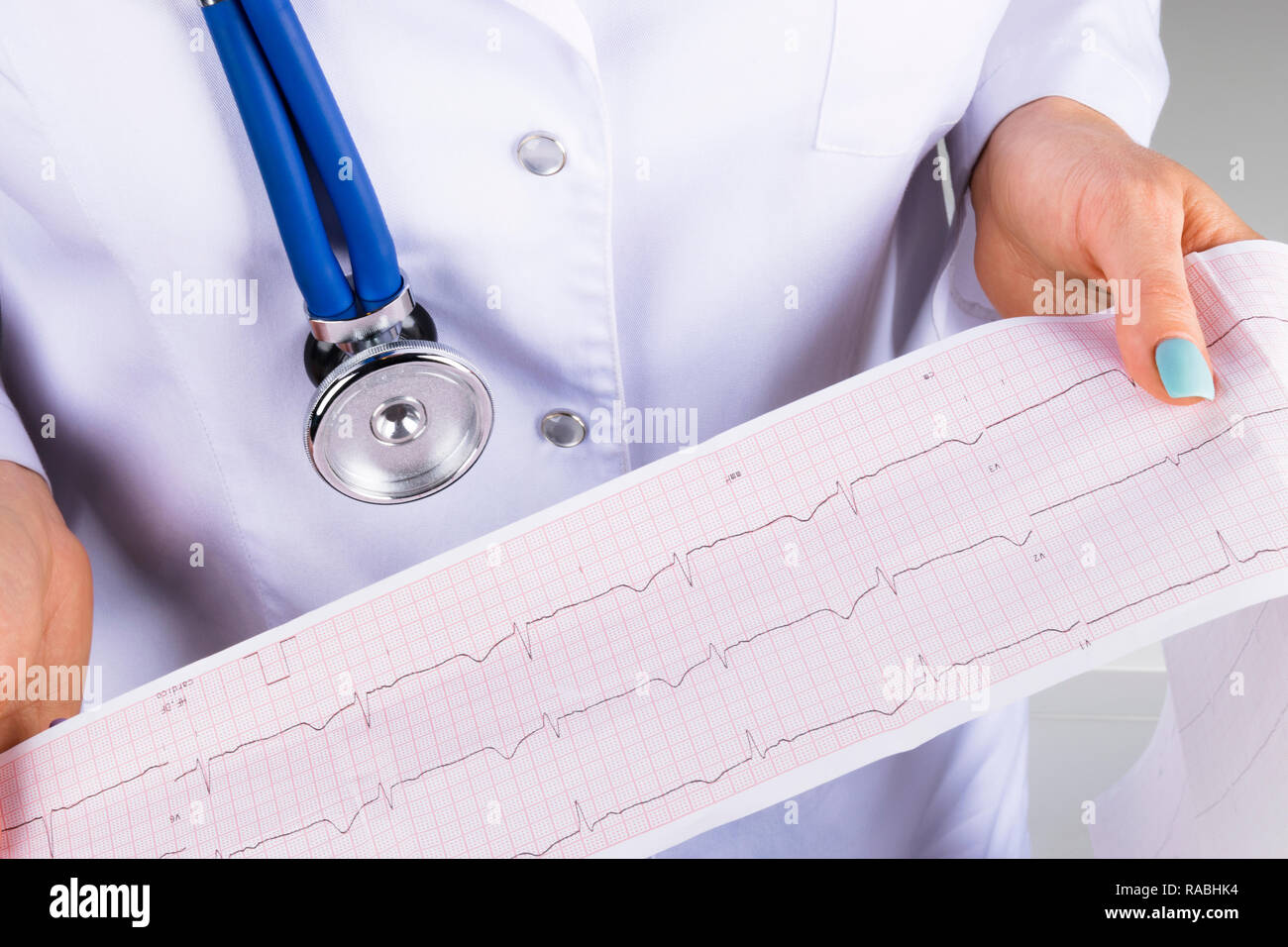 Electrocardiogram, ecg in hand of a female doctor. Medical health care ...