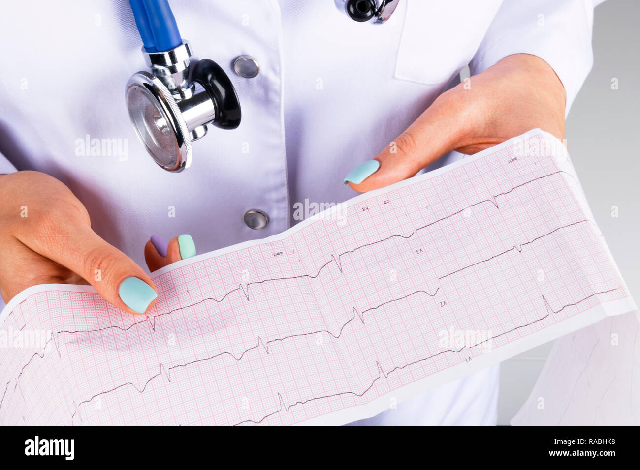 Electrocardiogram, ecg in hand of a female doctor. Medical health care ...