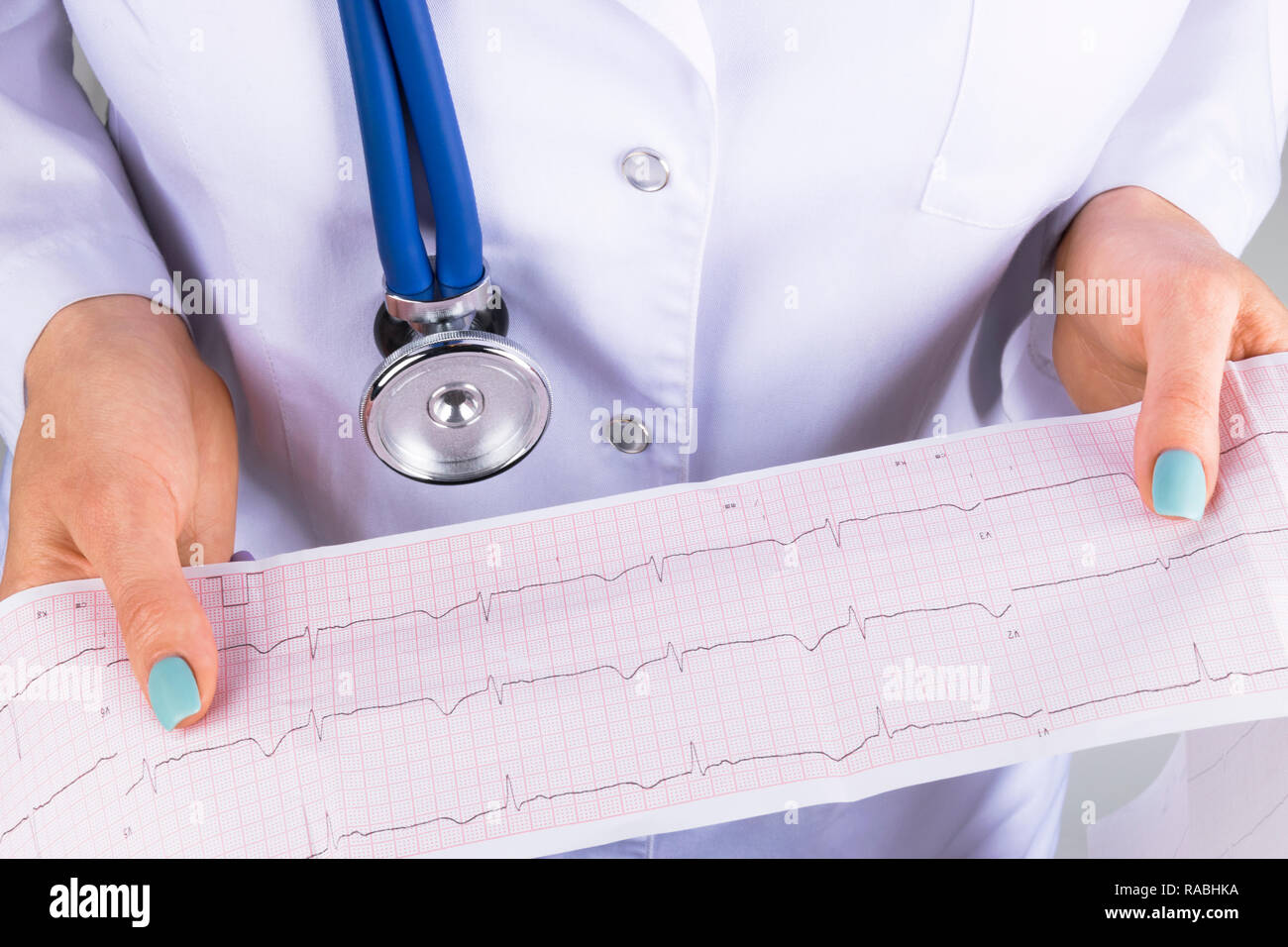 Electrocardiogram, ecg in hand of a female doctor. Medical health care ...
